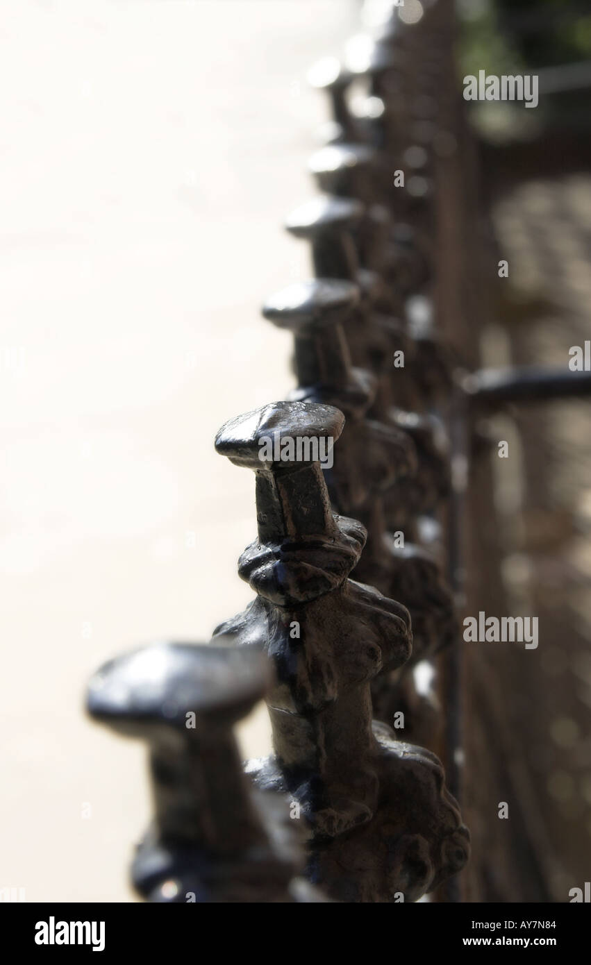 Vertical image black wrought iron fence from above Stock Photo - Alamy