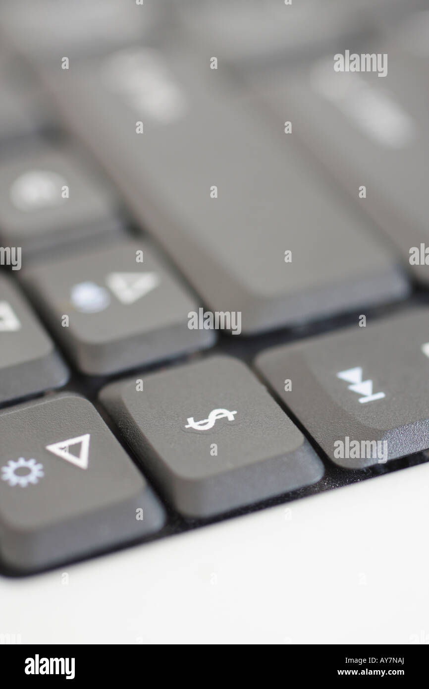 Close Up Of Laptop Keyboard With Dollar Symbol Stock Photo - Alamy