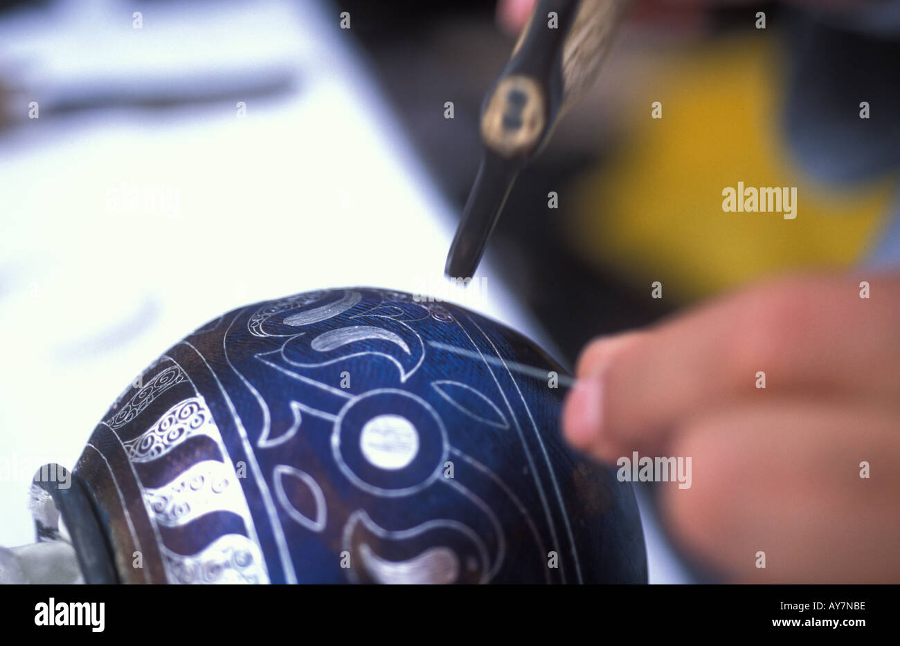 Detail of man working on traditional embroidery, Morocco Stock Photo ...