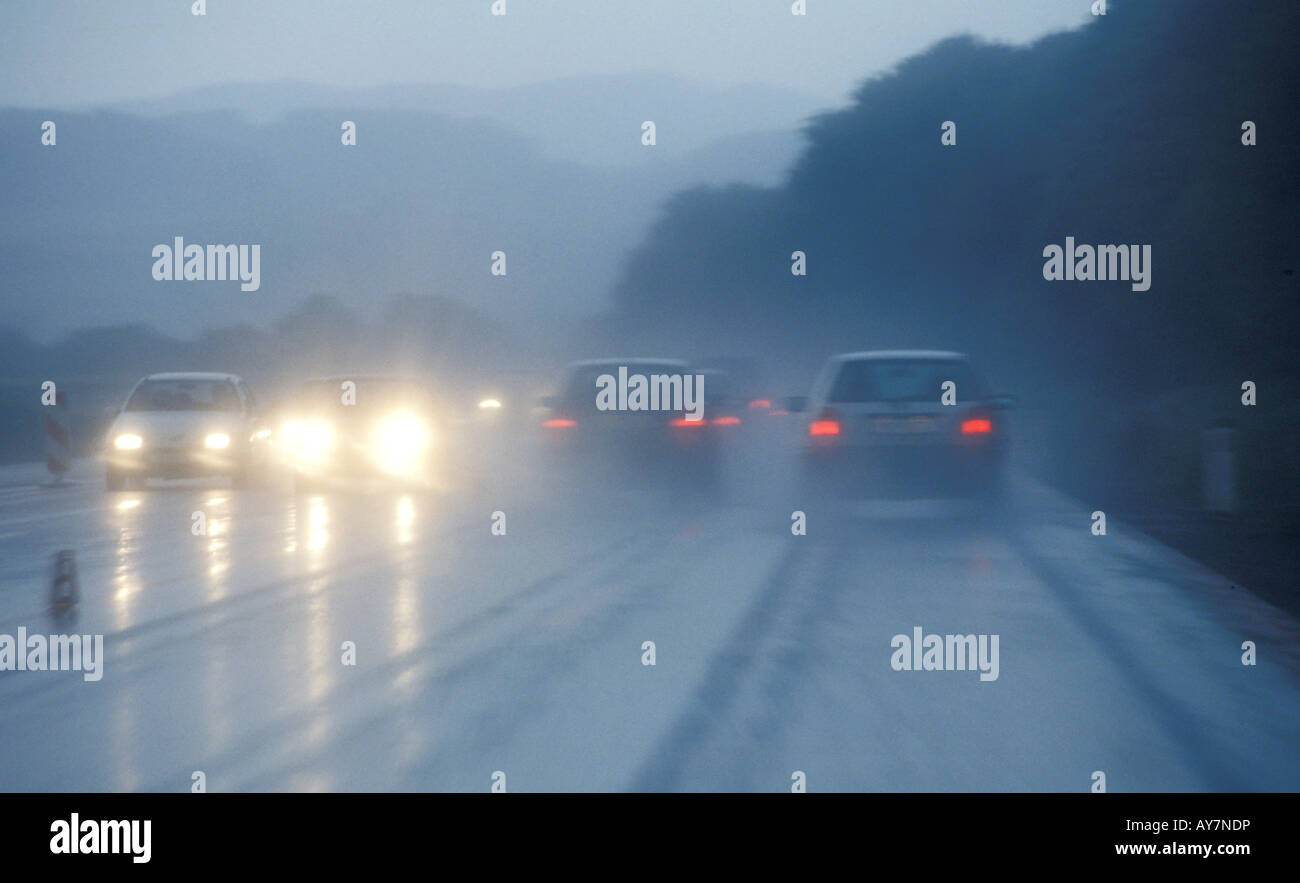 Traffic at rain Stock Photo - Alamy