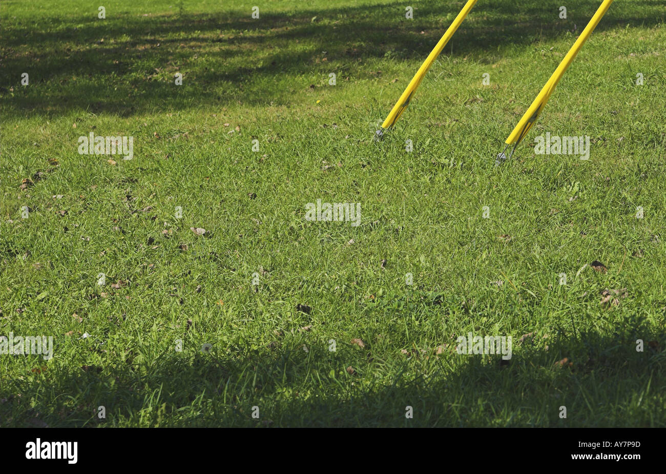 Utility support wires embedded into ground Stock Photo - Alamy