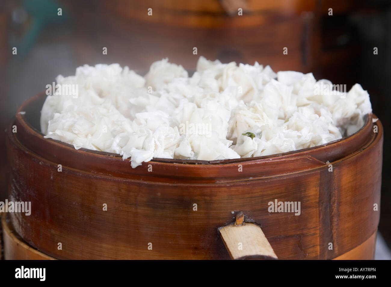 Dumplings In Wooden Steam Baskets Stock Photo - Alamy