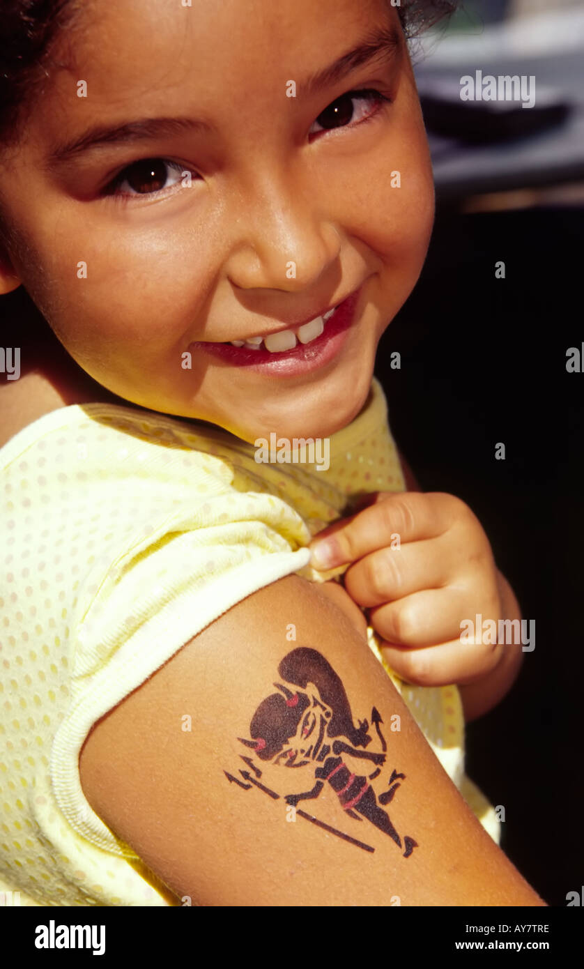 MR 694 Hispanic girl Myranda displays her airbrushed tattoo, at the ...