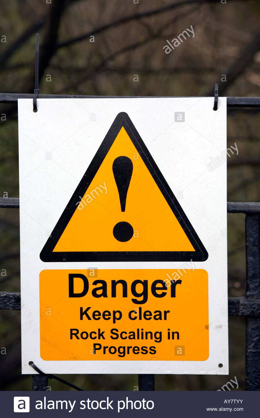 Rock Scaling in Progress sign Stock Photo - Alamy