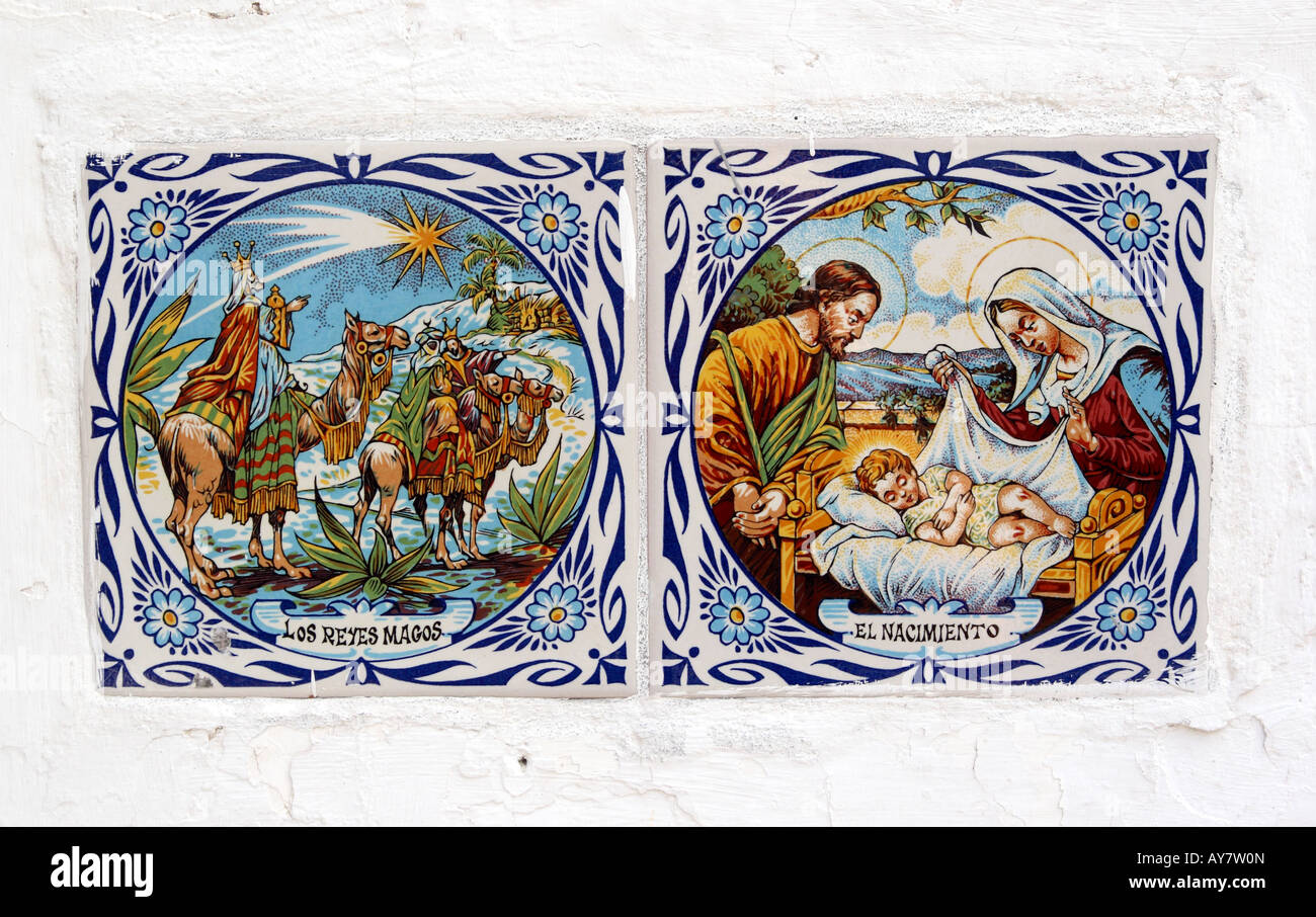 Religious themed wall tiles on a house in the town of Candelaria in ...