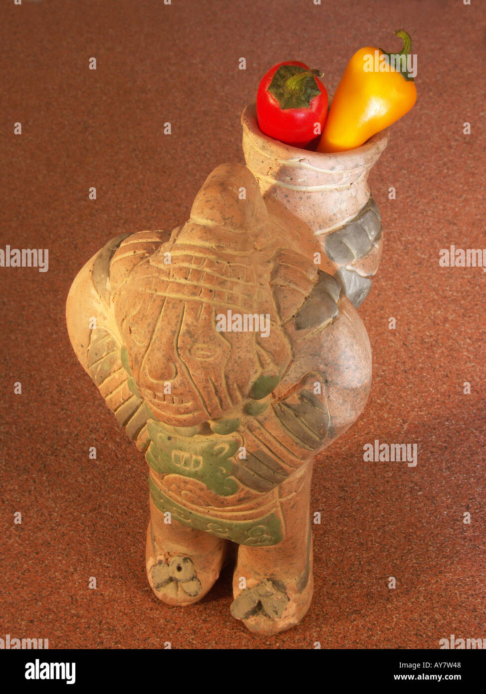 Pre-Columbian statue with chili peppers Stock Photo - Alamy