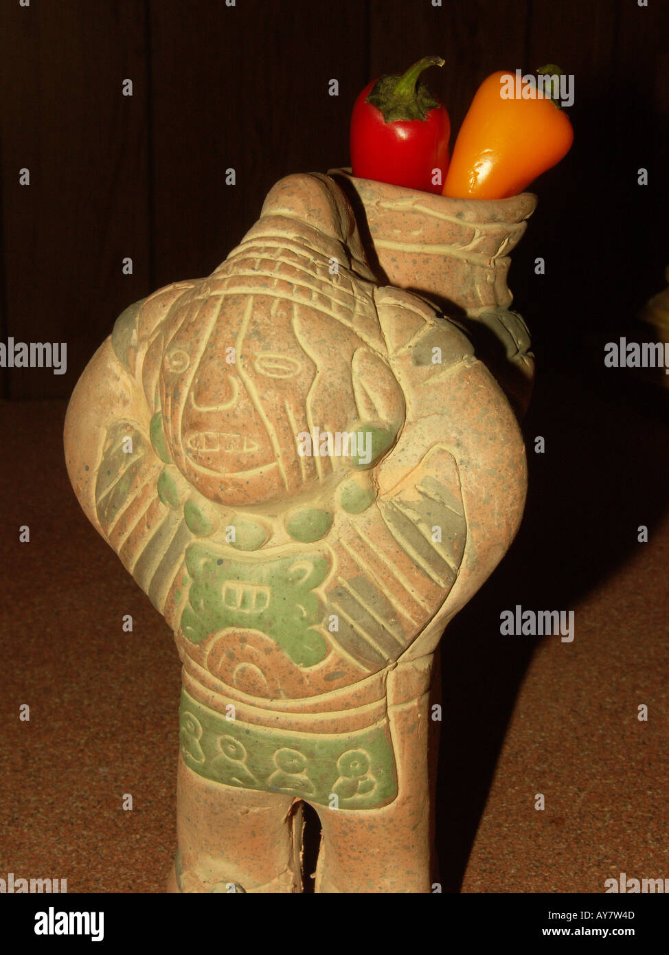 Pre-Columbian statue with chili peppers Stock Photo - Alamy