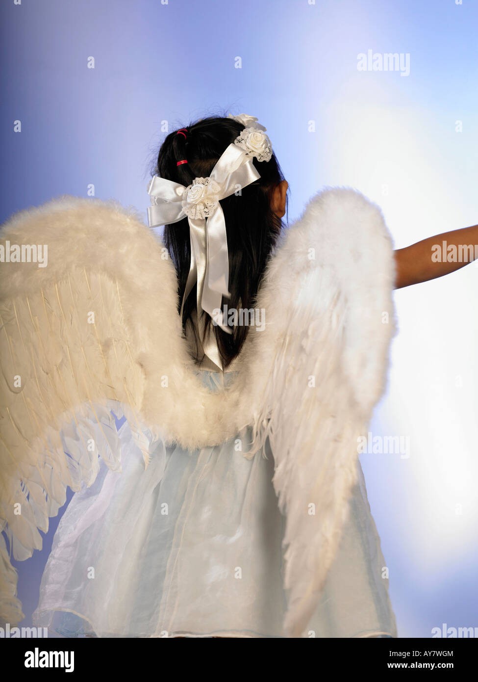 Back view of angel white wings Stock Photo - Alamy