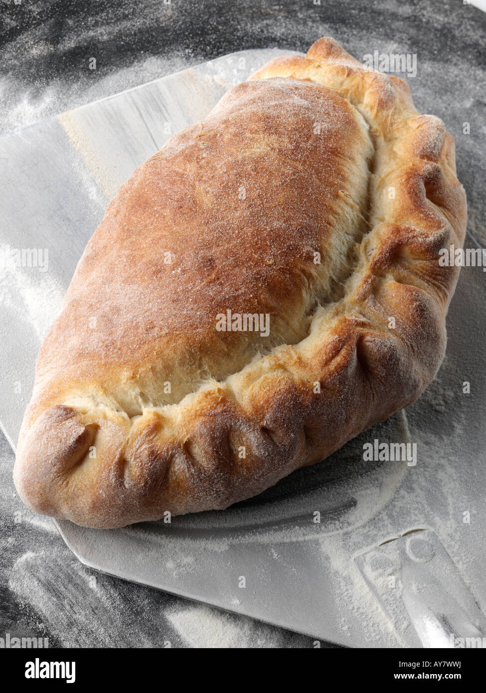 Half moon shaped stuffed pizza hi-res stock photography and images - Alamy