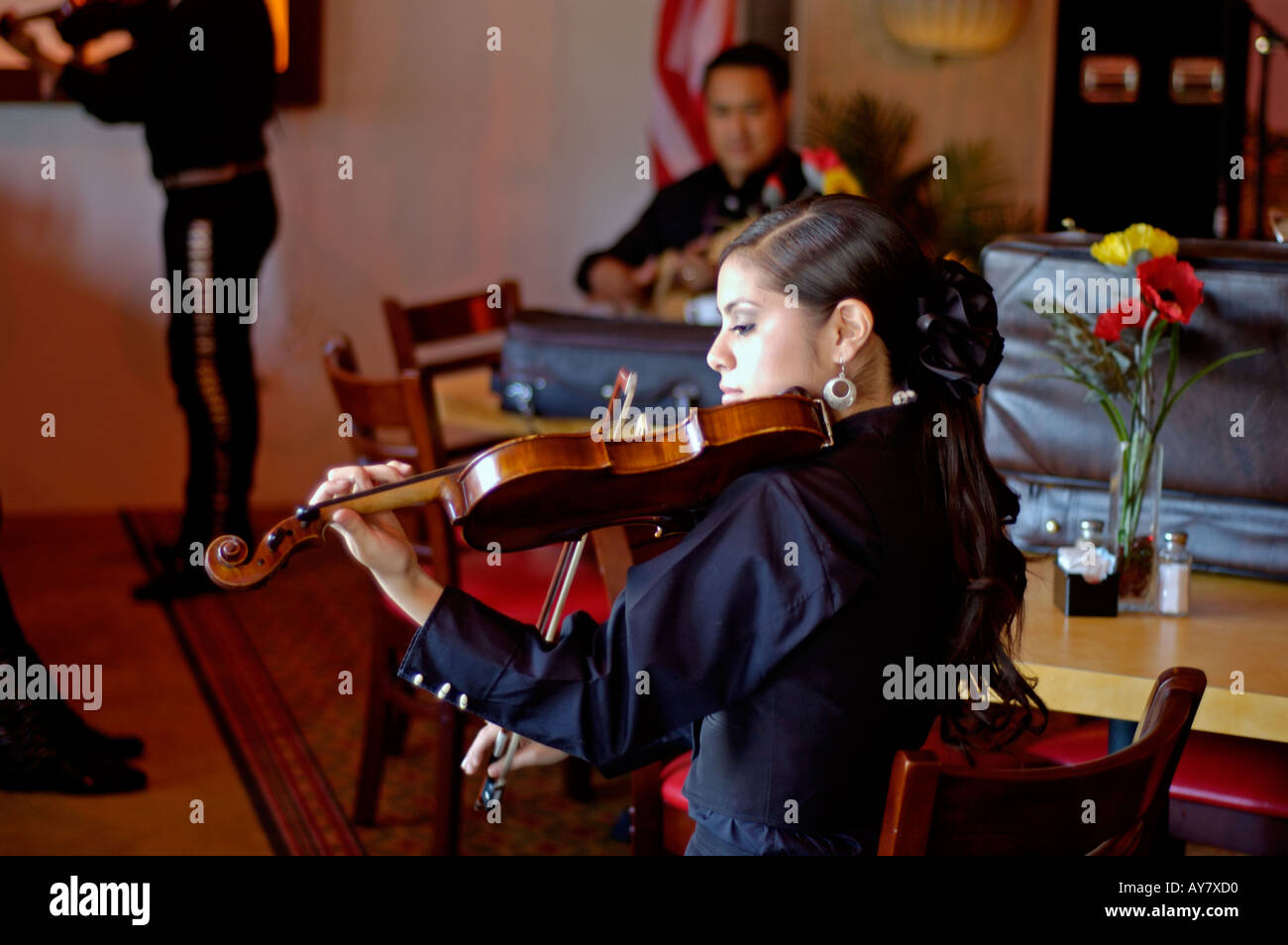 Female musician playing violin at Mexican mariachi band Stock Photo - Alamy
