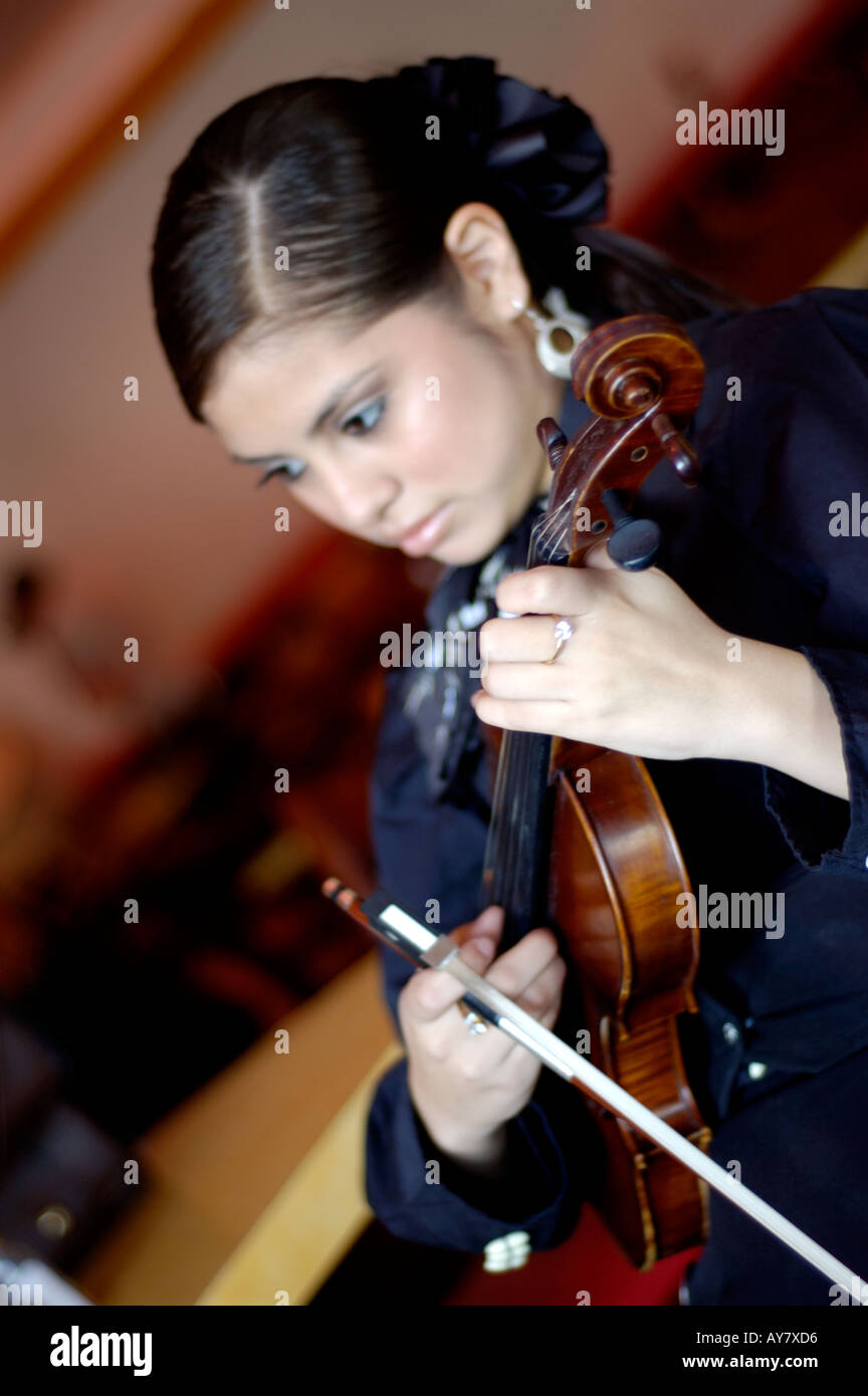 Female musician playing violin at Mexican mariachi band Stock Photo - Alamy