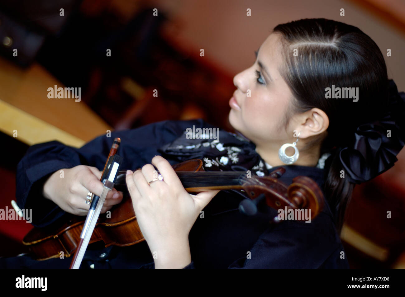 Female musician playing violin at Mexican mariachi band Stock Photo - Alamy