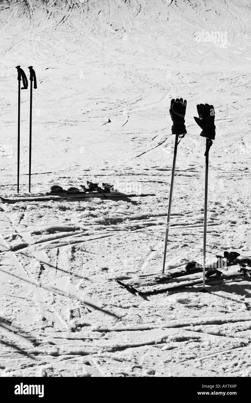 Skis And Poles Stuck In Snow Stock Photo - Alamy