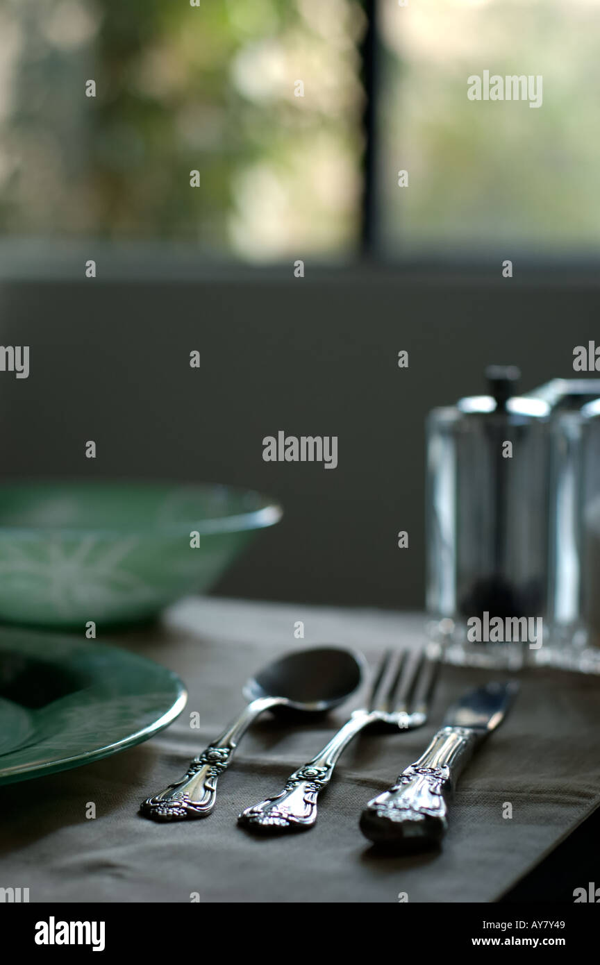 Table setting up close Natural light from window on background Stock ...