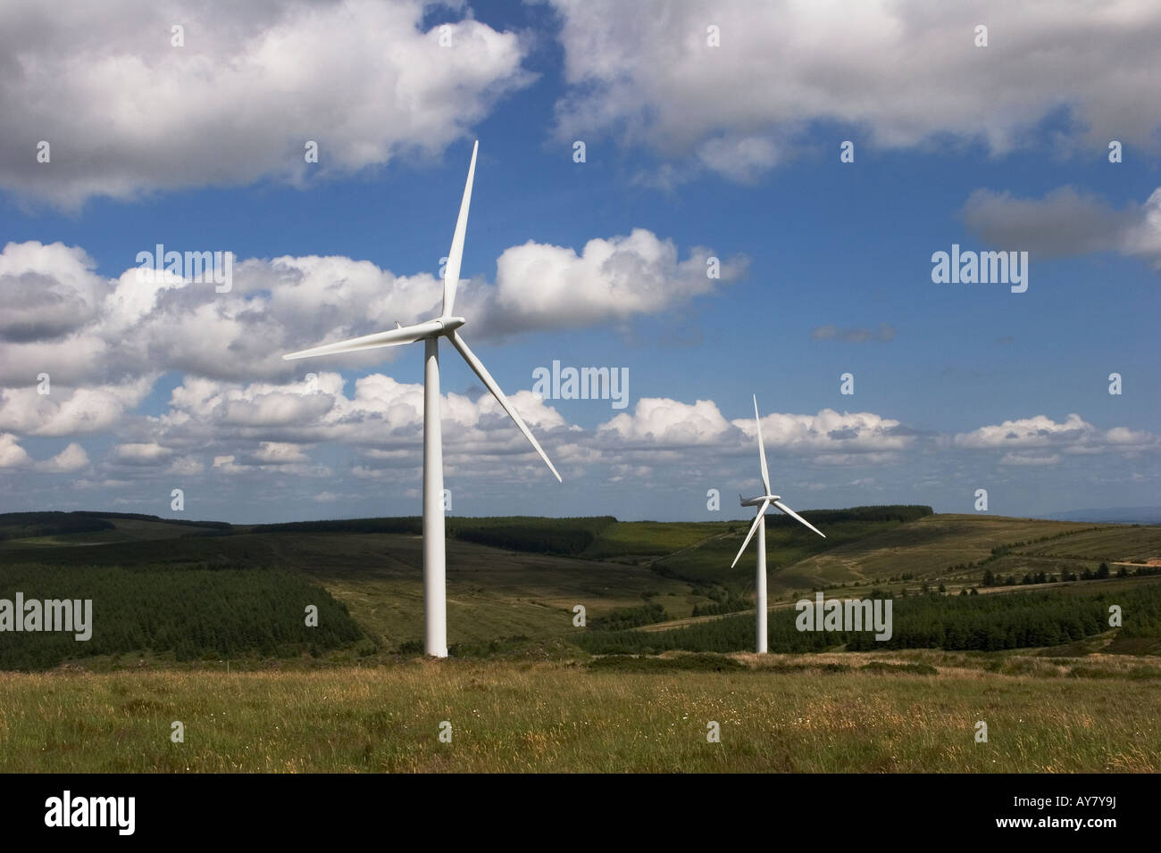 Wind power turbines on windfarm producing electricity for part of ...
