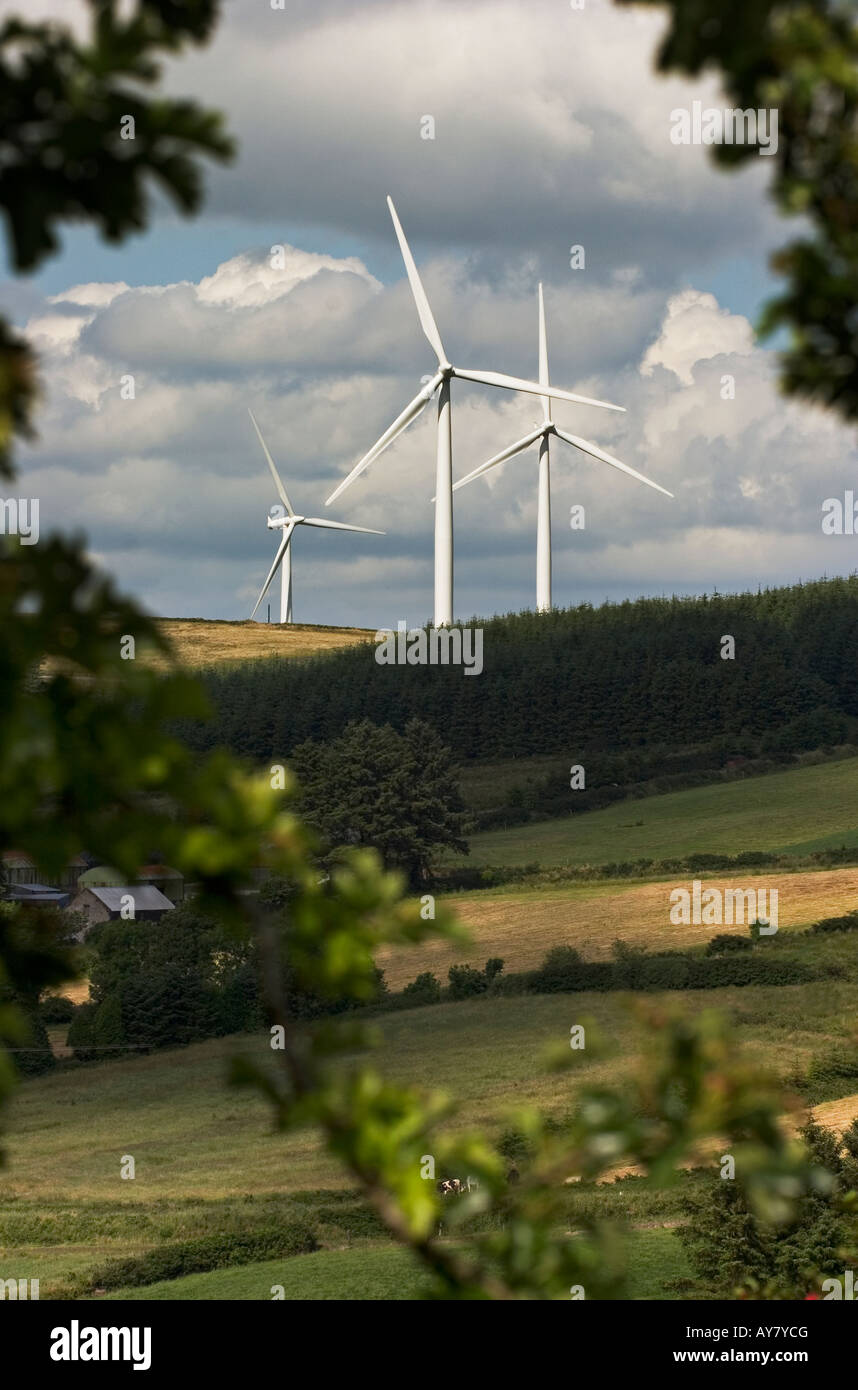 Wind power turbines on windfarm producing electricity for part of ...