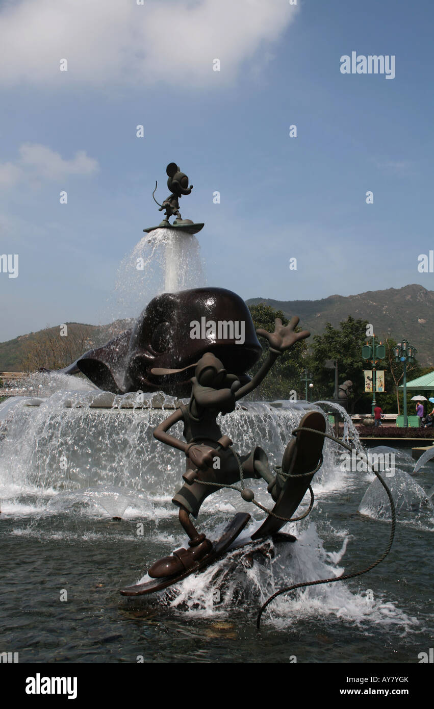 Goofy and mickey mouse on spout of whale fountain Hong Kong Disneyland ...
