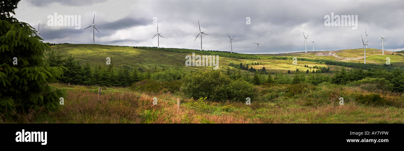 Panorama of wind power turbines on windfarm producing electricity for ...