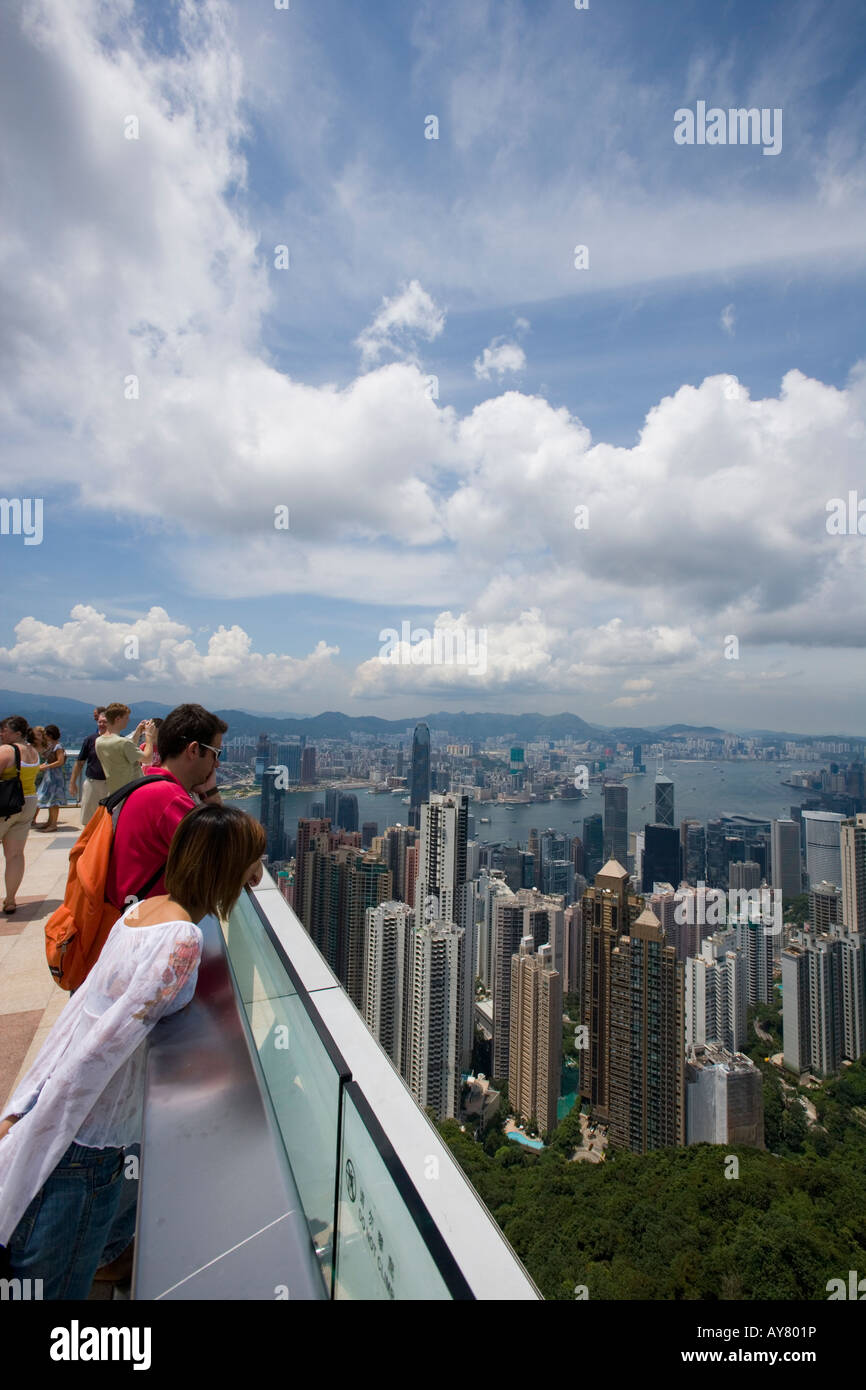 Tourists on the viewing platform on Victoria Peak with a view over to ...