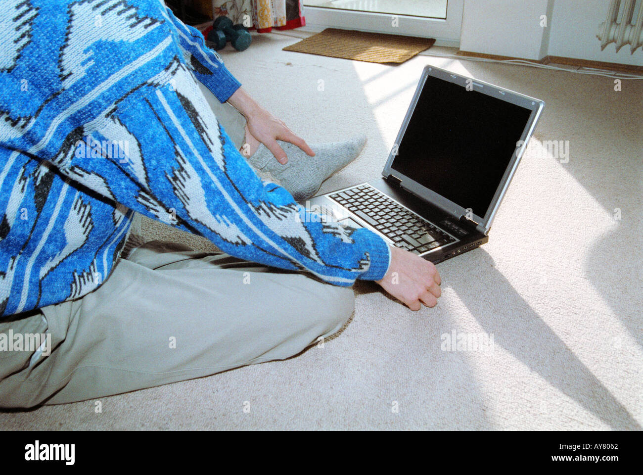 Man open his Notebook and try install it Stock Photo - Alamy Man open his Notebook and try install it Stock Photo - Alamy