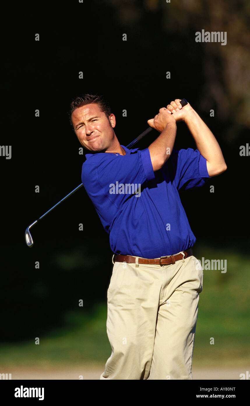Male golfer in action hi-res stock photography and images - Alamy