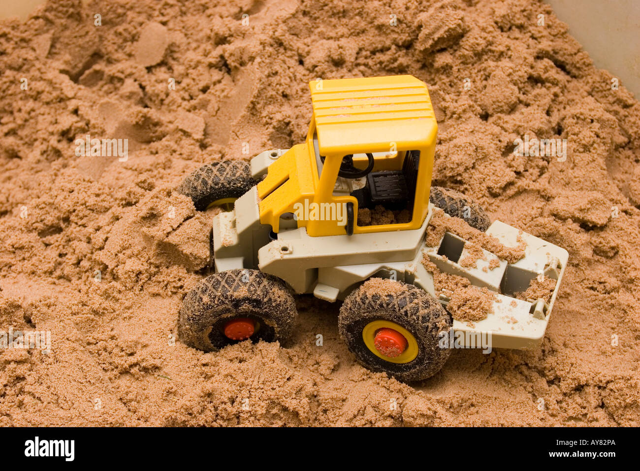 Children playing in sand pit hi-res stock photography and images - Alamy
