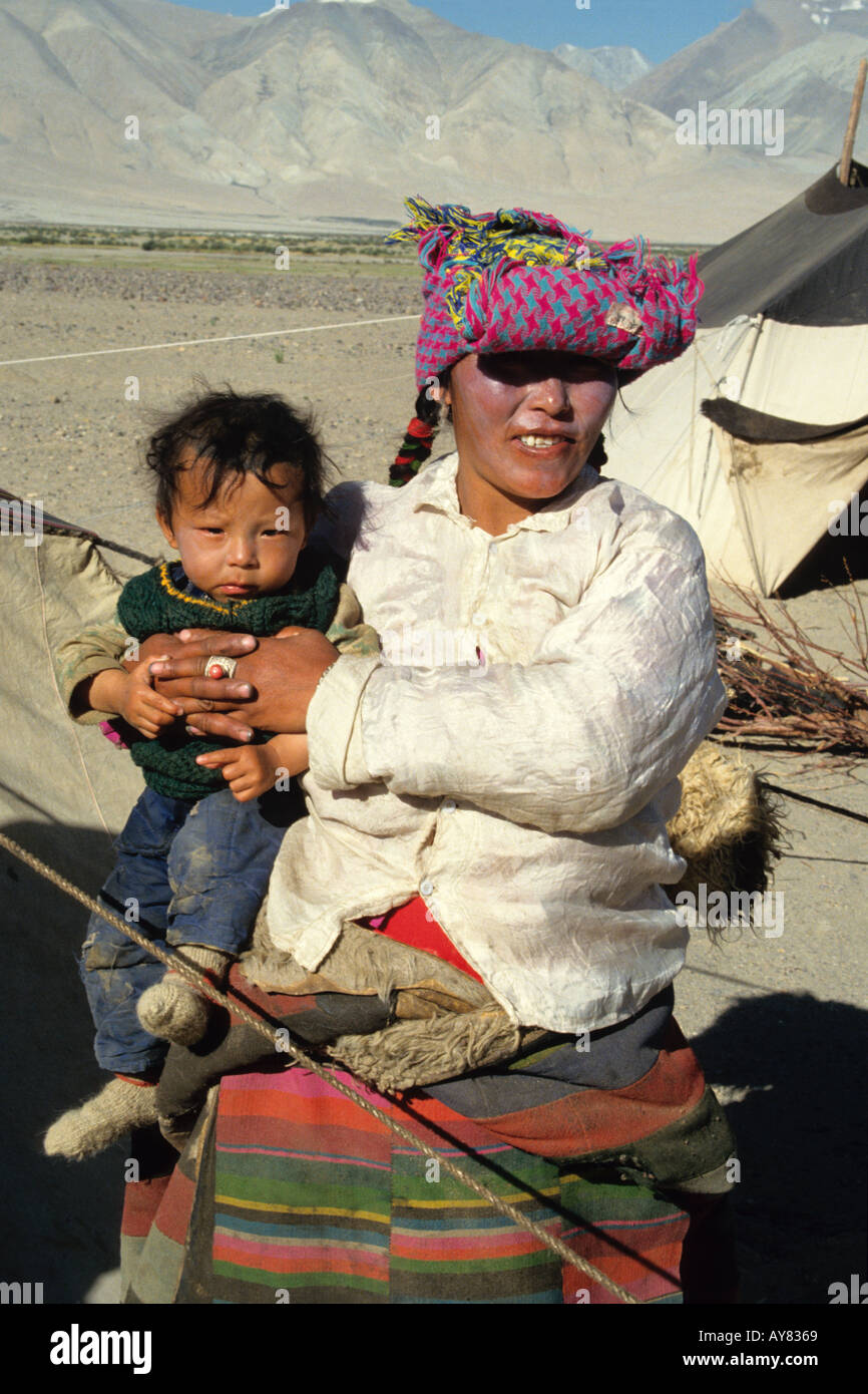 Nomad mother and baby camping on pilgrimage to sacred Mount Kailash in ...