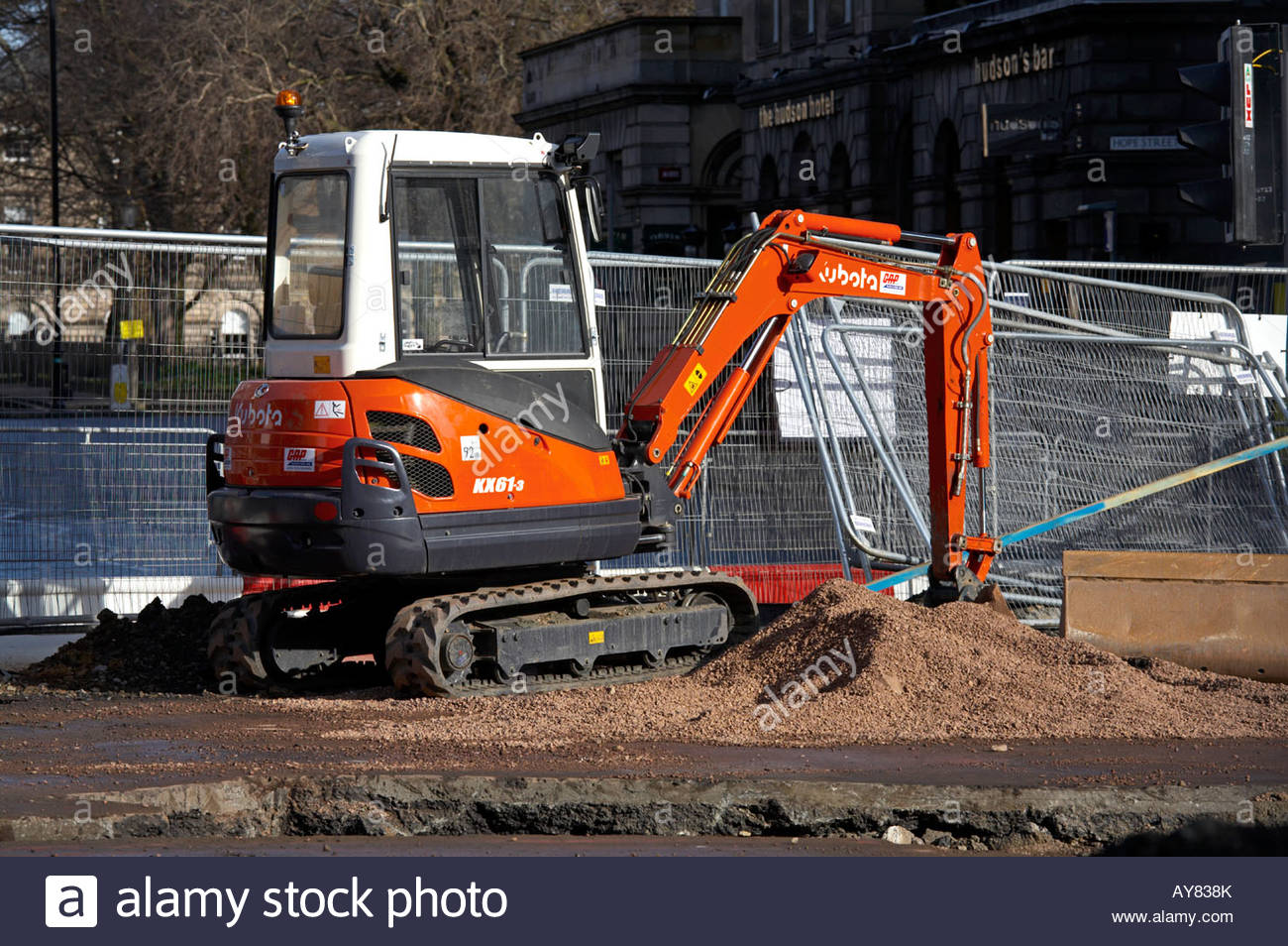 Small mechanical digger Stock Photo - Alamy