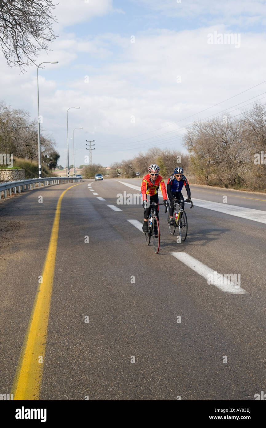Israel recreational bicycle riders in full gear on a quiet street Stock ...