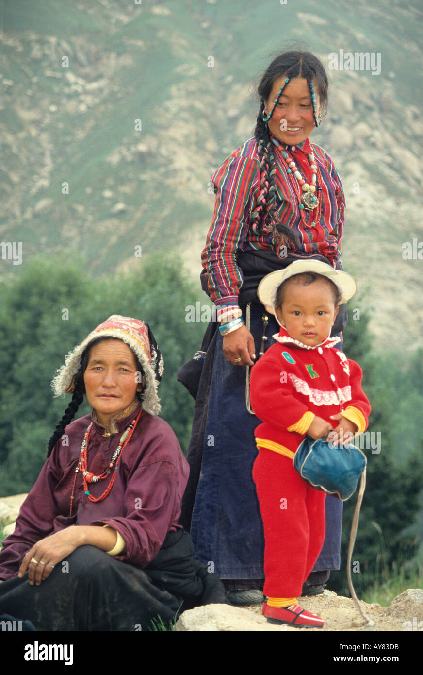 Three generations of a Tibetan Family showing change from traditional ...