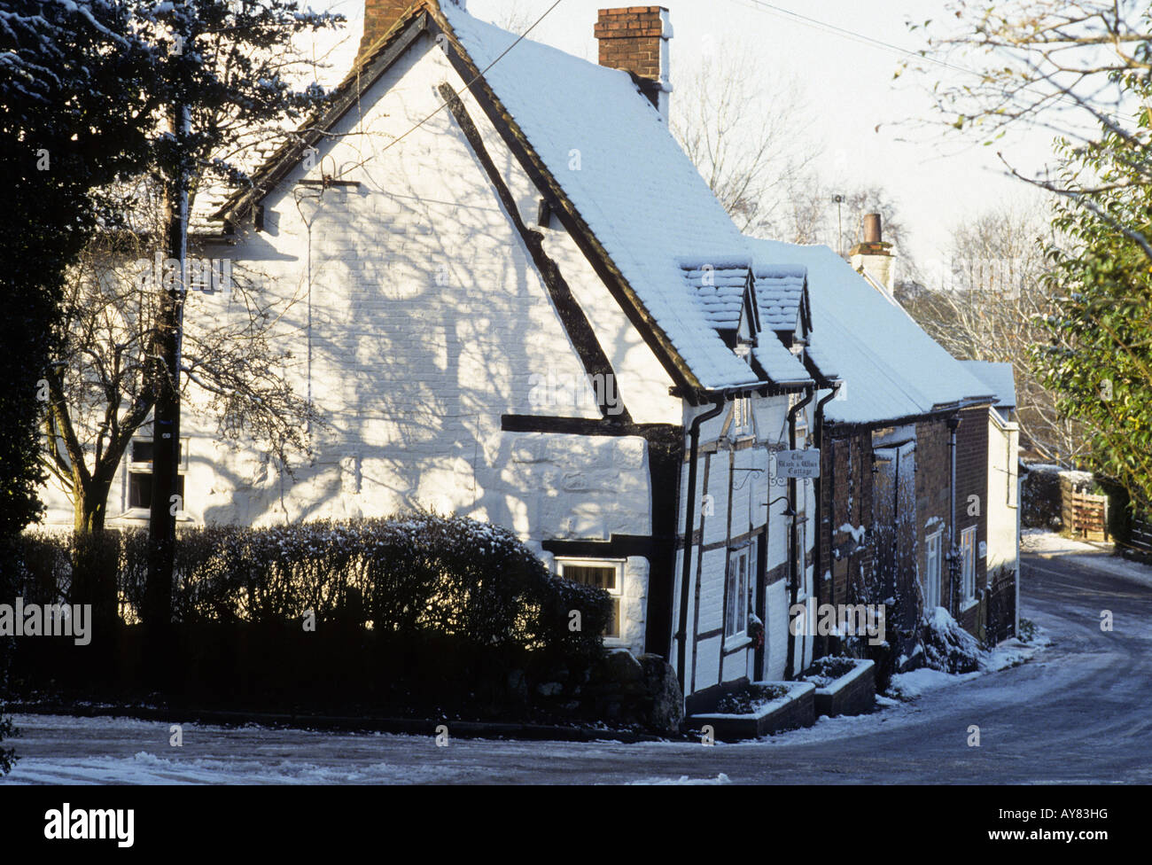 Black and white cottage in snow, Brocton, Staffordshire, England Stock ...