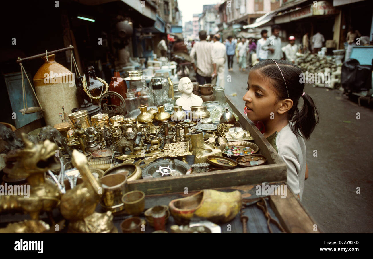 India Tamil Nadu Madurai girl at pilgrims trinket stall Stock Photo - Alamy