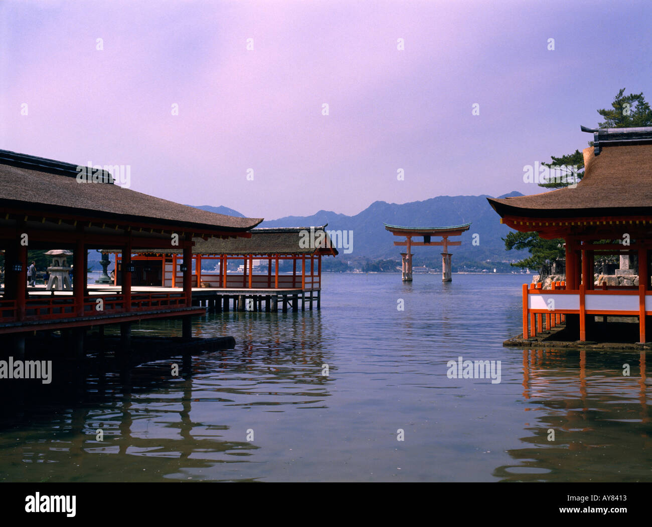 Itsukushima Shrine built on stilts above tidal water at Miyajima ...