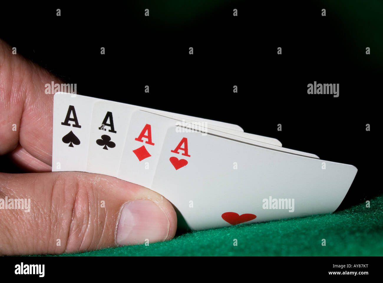 A card player is dealt a hand of four aces Stock Photo - Alamy