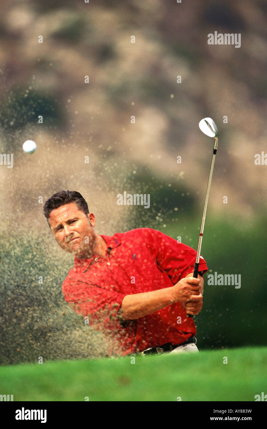 Male golfer in action Stock Photo - Alamy