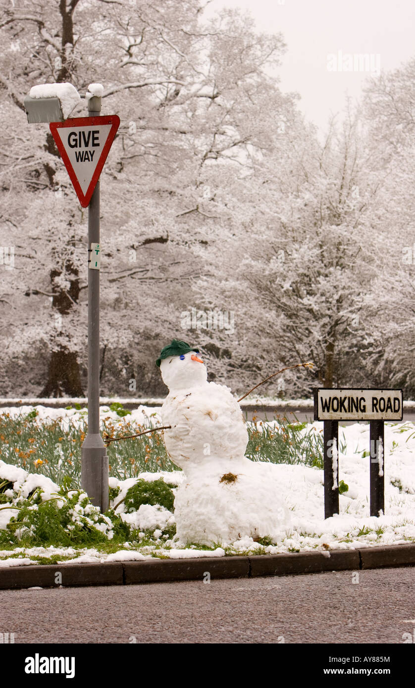 Snowman at the side of the road Stock Photo - Alamy
