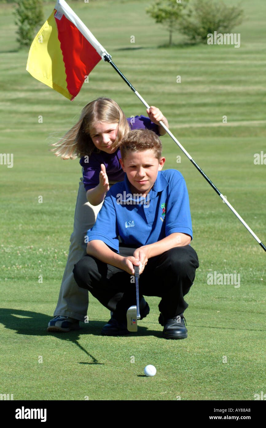 Young caddie hi-res stock photography and images - Alamy