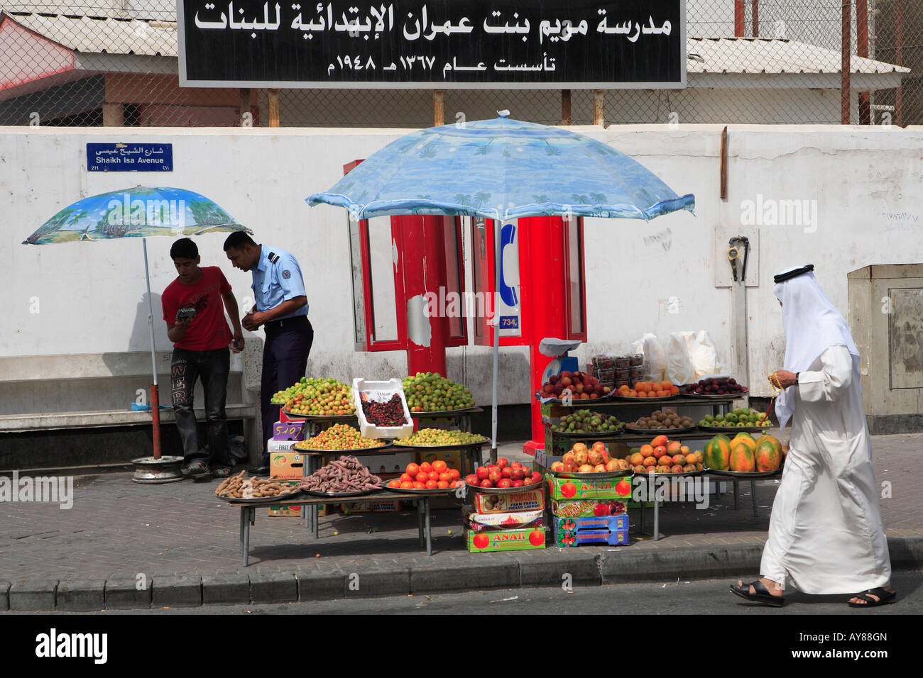 Bahrain Muharraq street scene market people Stock Photo - Alamy