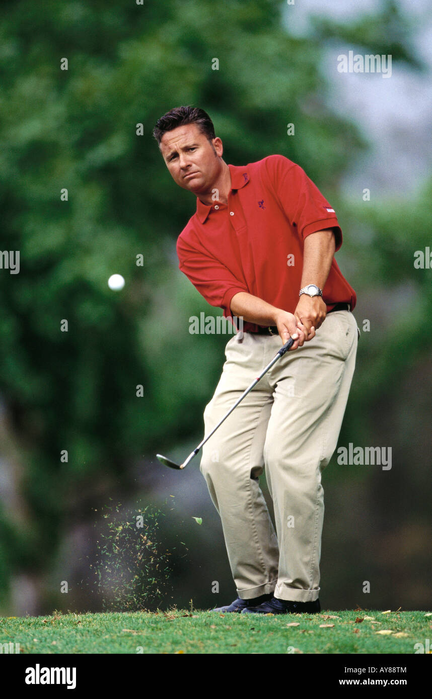 Male golfer in action Stock Photo - Alamy