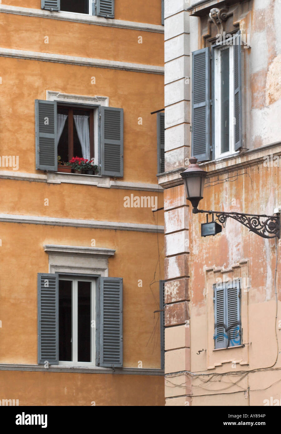 Windows of a traditional Italian building with shutters in Piazza Santa ...