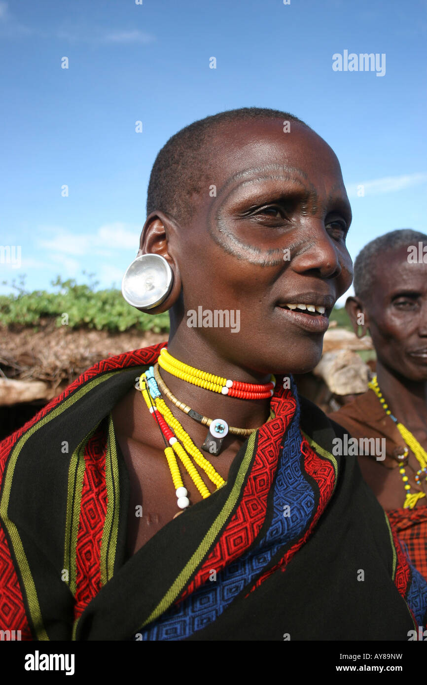 Africa Tanzania members of the Datoga tribe Woman in traditional dress ...
