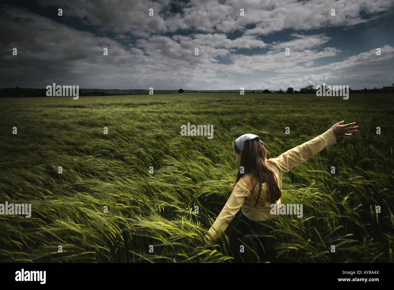 girl in field Stock Photo - Alamy