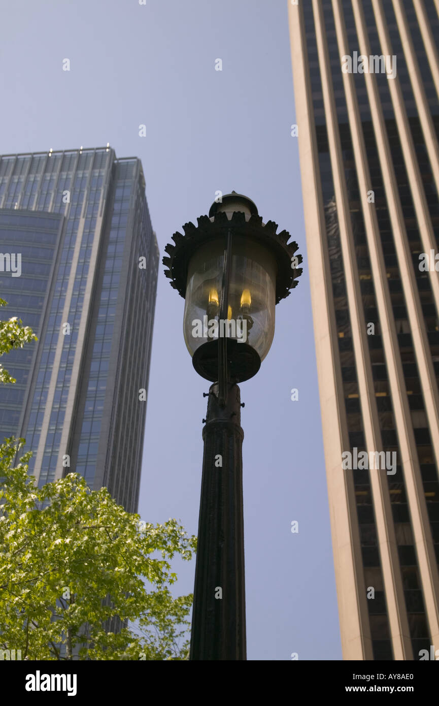 Gas light street lamp between two buildings Stock Photo - Alamy