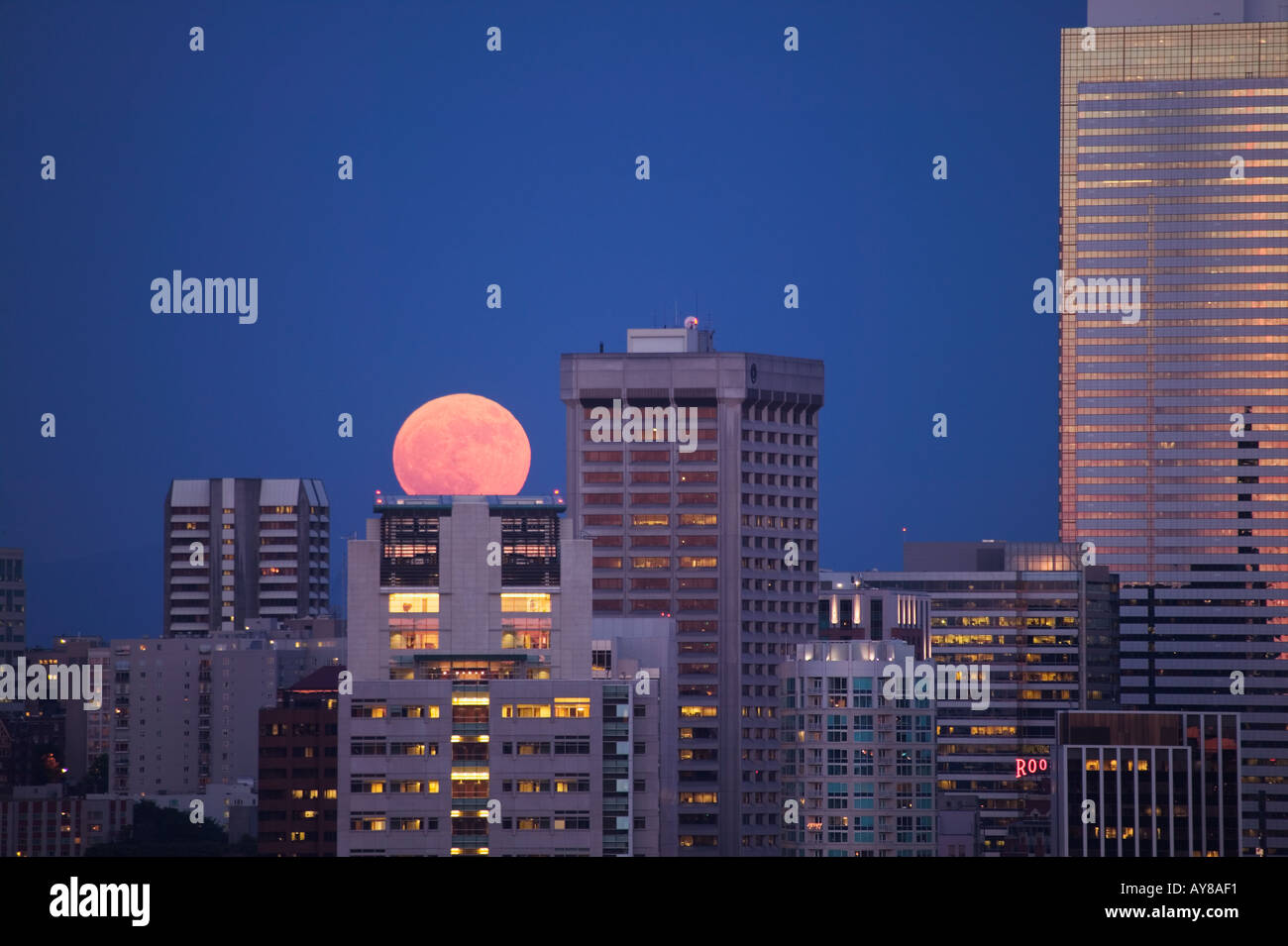 Full moon rising over Seattle WA skyline near summer solstice Stock ...