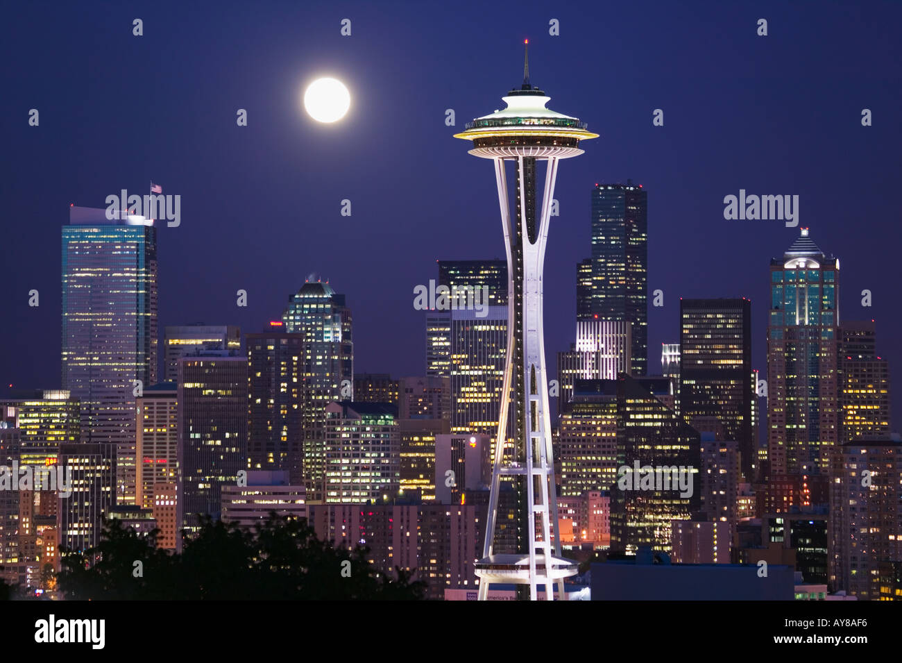 Full moon rising over Seattle WA skyline near summer solstice Stock ...