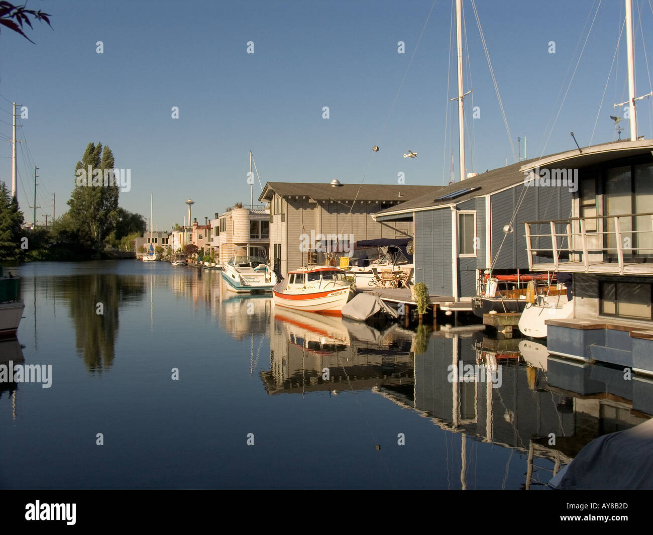 Houseboat community on east side of Lake Union with Space Needle in ...