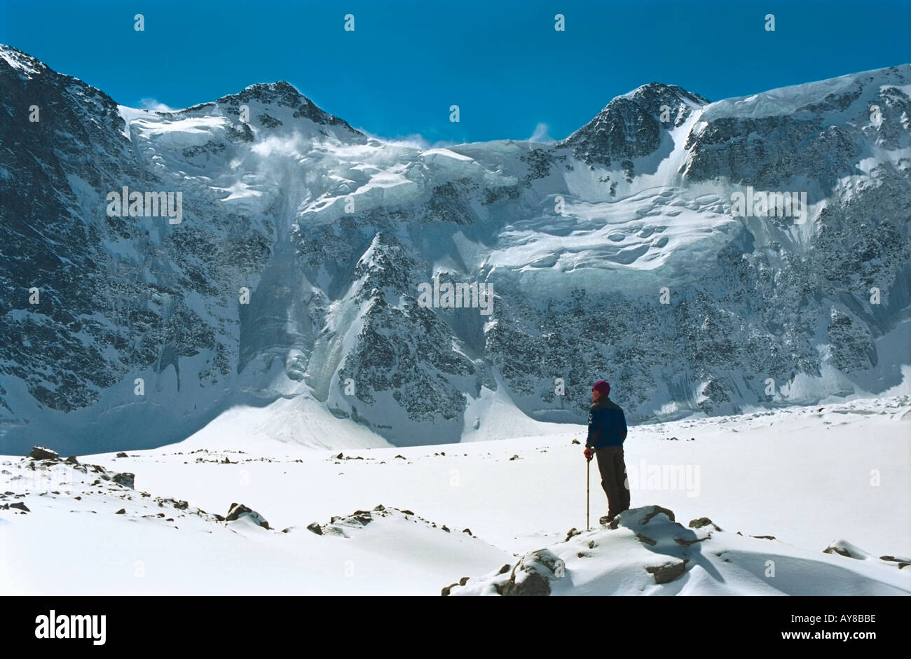 Mountain climber and the Belukha Mountain at background The Katunskiy ...