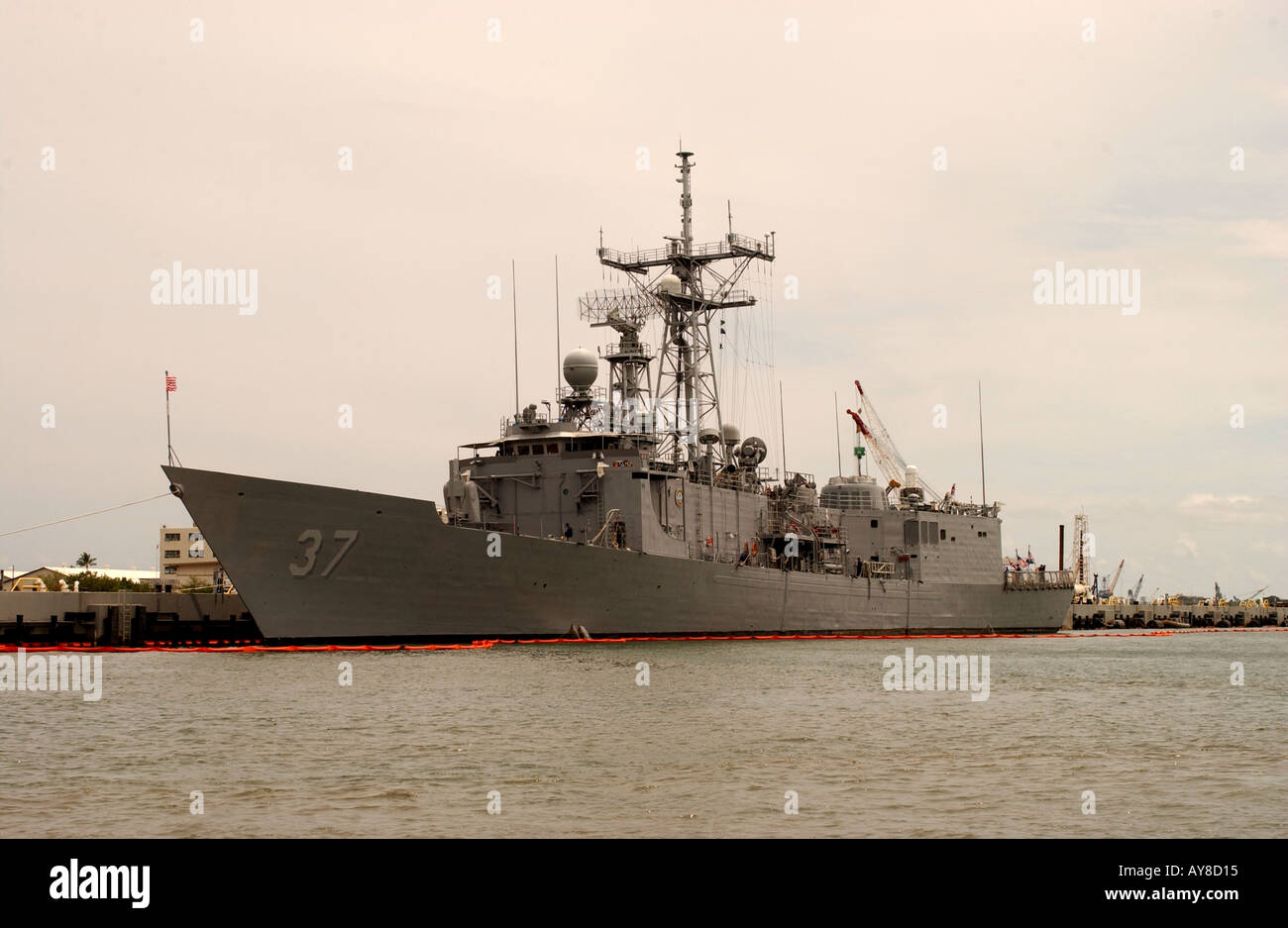 Horizontal color image of a US Navy ship in port at Pearl Harbor on ...