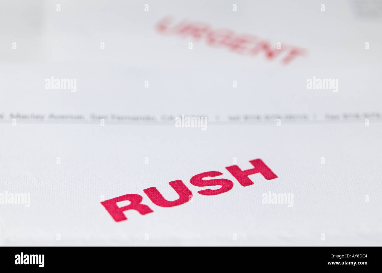 Rush paperwork on office desk Stock Photo - Alamy