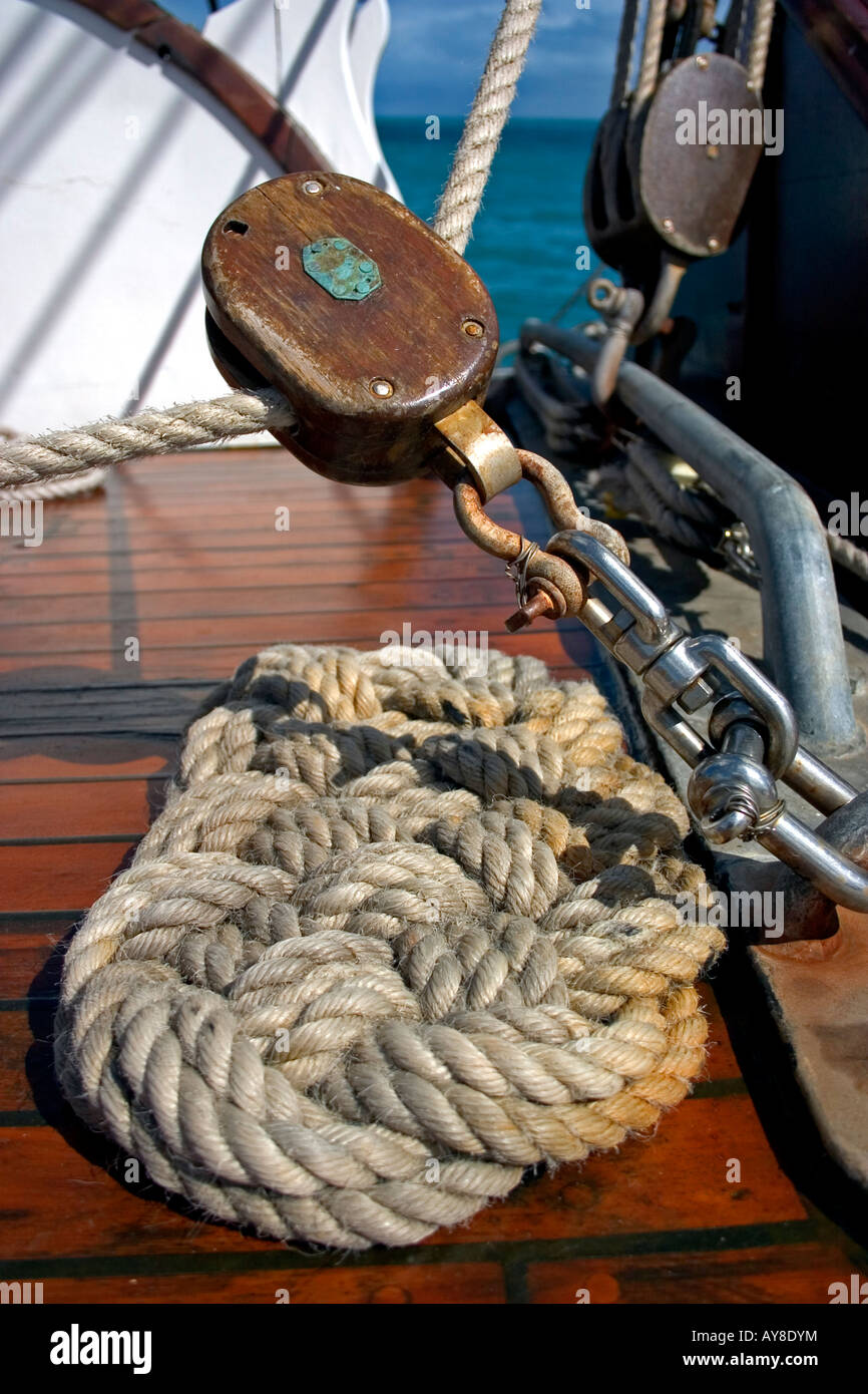 Rope and pulley onboard a tall ship Stock Photo - Alamy